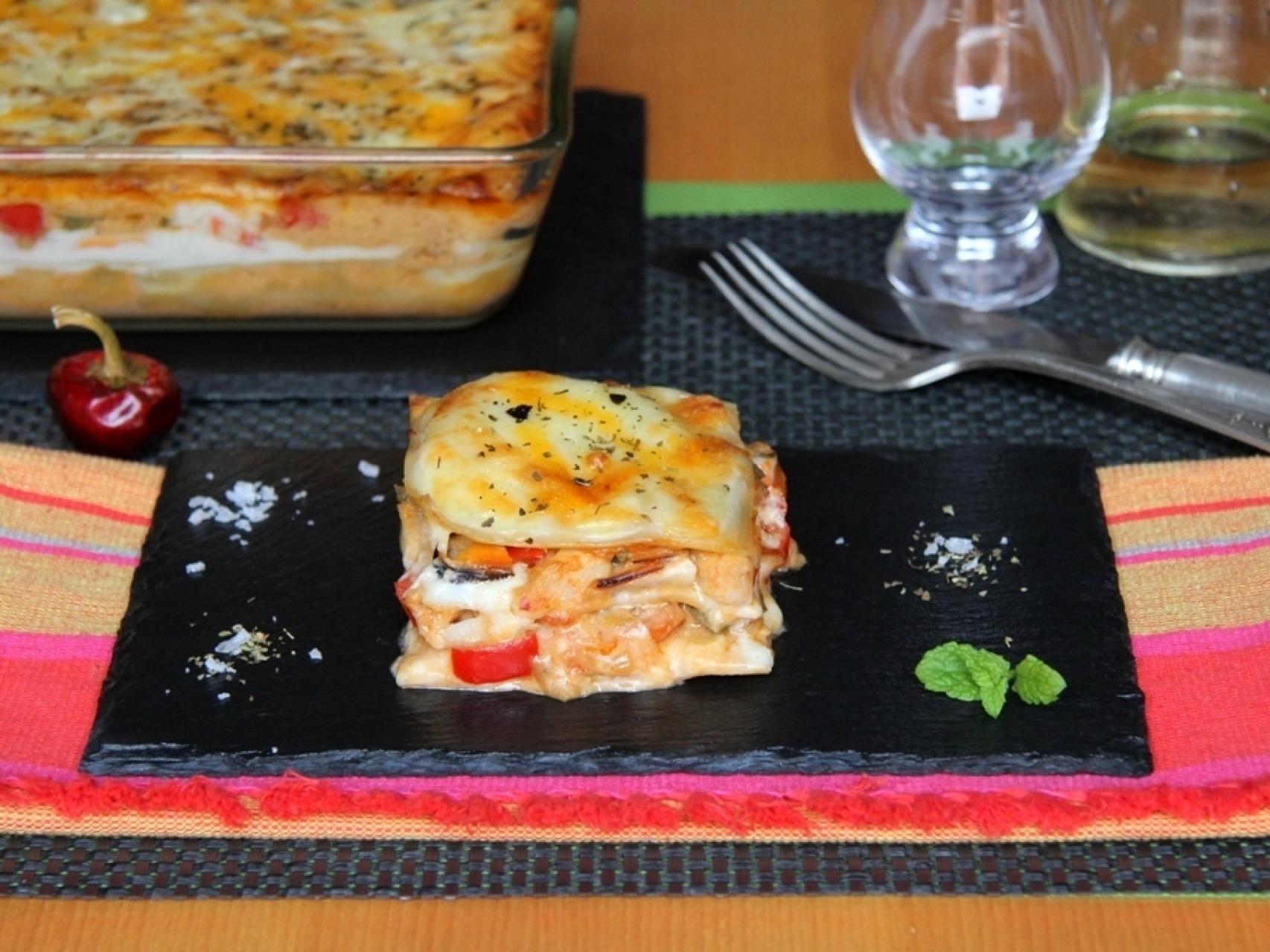 Lasaña de merluza con mejillones y gambones